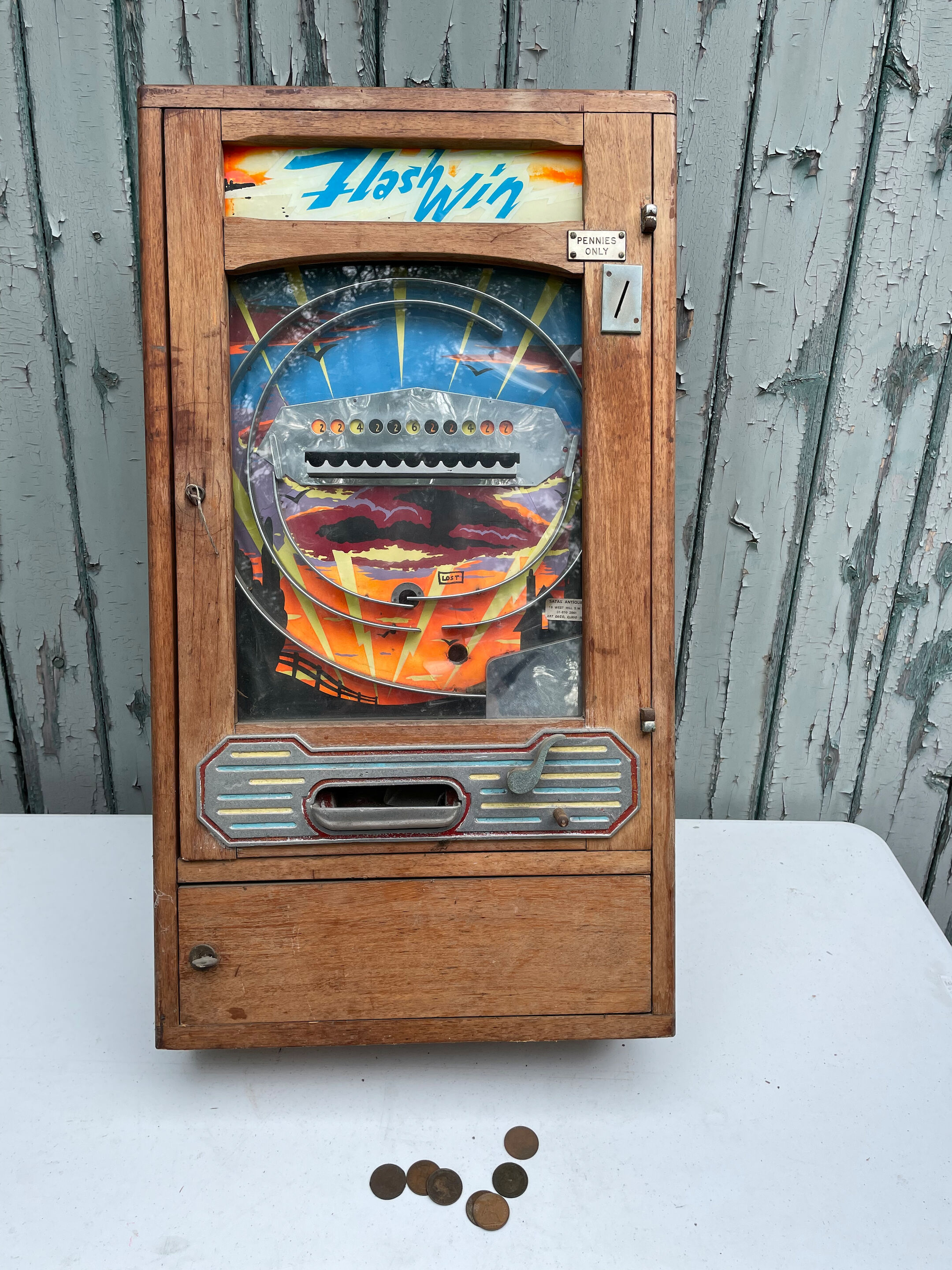 Bonhams Cars : A Flash Win wall mounted arcade amusement machine,