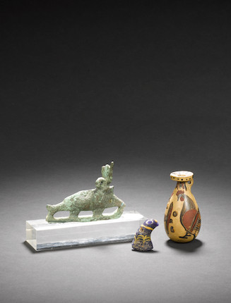 Bonhams : A Corinthian pottery alabastron a Greek core-formed glass ...