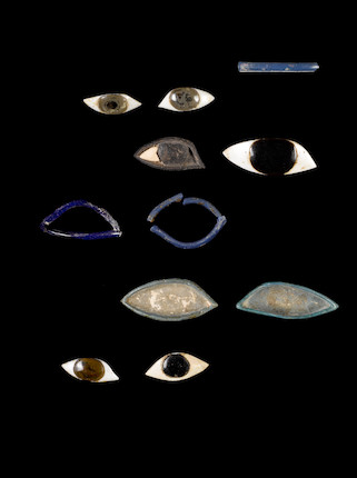 Bonhams : A pair of Egyptian eye inlays and eleven mixed eye fragments 13