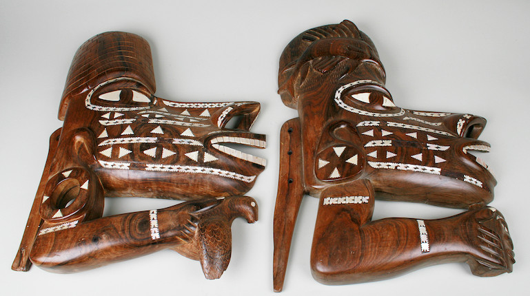 Bonhams : A pair of Solomon Islands carved hardwood profile mask ...