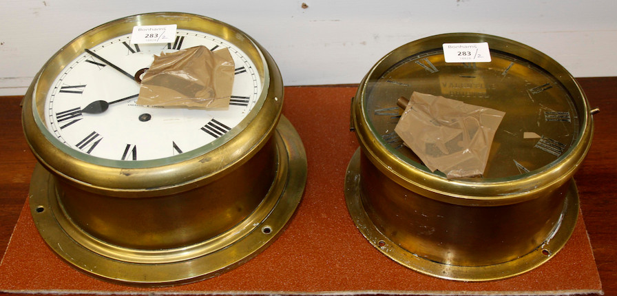 Bonhams : Two brass circular ship clocks