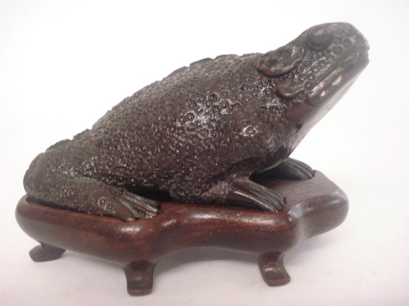 Bonhams : A bronzed metal three legged toad 19th century