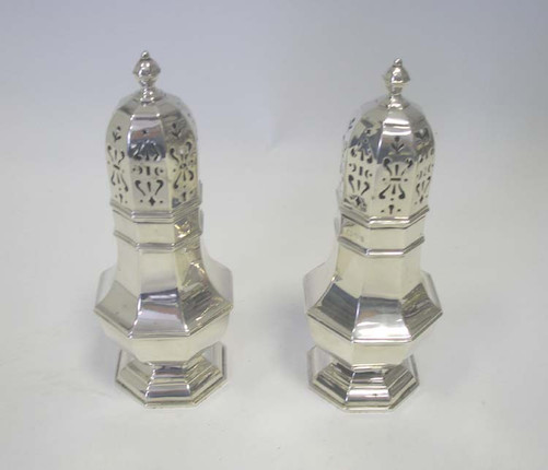 Bonhams : A pair of 18th century style silver casters, by Goldsmiths ...