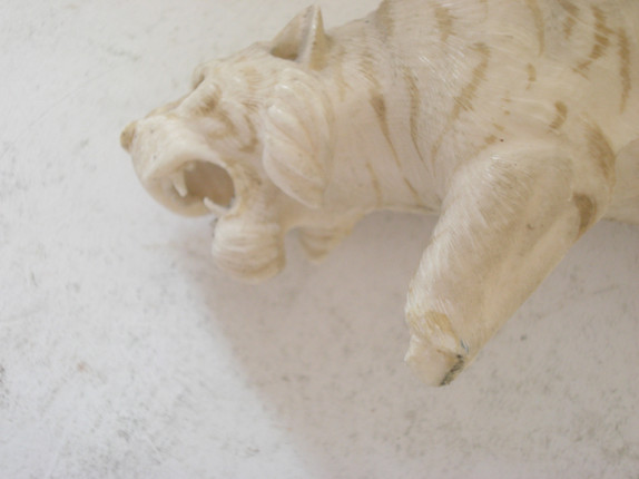 Bonhams : A carved ivory tiger, Meiji,