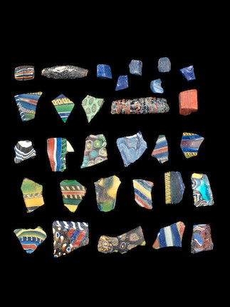 Bonhams : Twenty Roman mosaic glass fragments three glass beads and ...