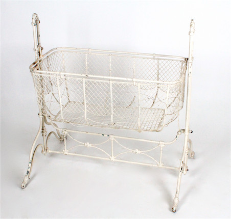 Bonhams : An early 20th century wrought iron and wirework cradle