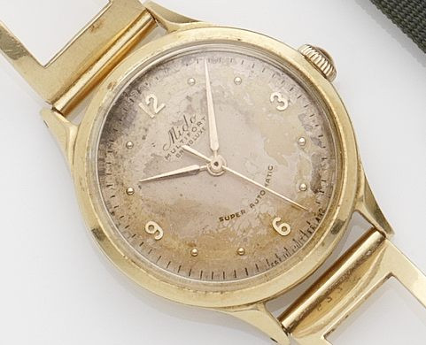 Bonhams : Mido. An 18ct gold bracelet watchCase No.1255774, Circa 1950