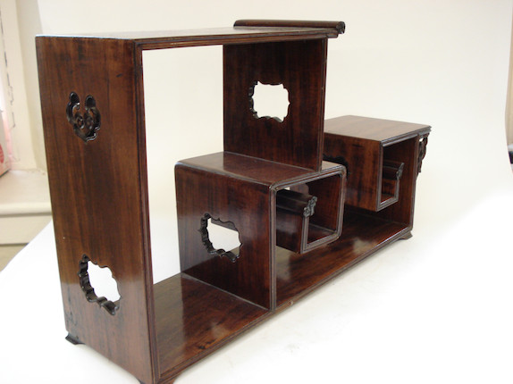 Bonhams : A pair of wooden table top display stands