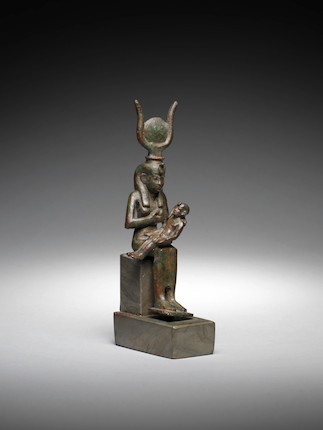 Bonhams : An Egyptian bronze figure of Isis and Horus