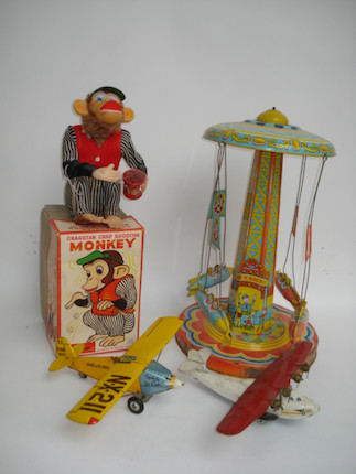 Bonhams : Alps for Cragstan Crap Shooting Monkey, Carousel toy and two ...