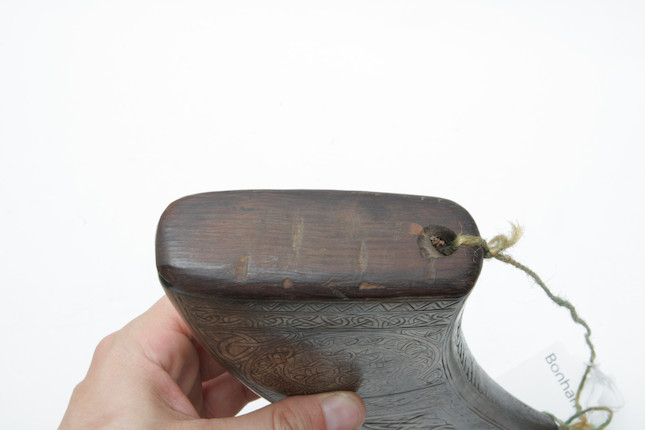 Bonhams : A large Scottish cow horn powder flask, probably 19th century