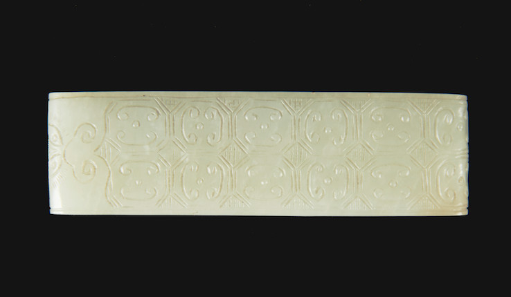 Bonhams : A jade sword slide Qing Dynasty