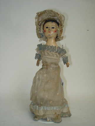 Bonhams : George III wooden doll, English circa 1770