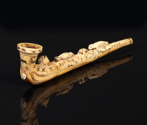 Bonhams : An Eskimo ivory pipe