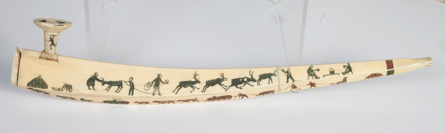 Bonhams : An Eskimo scrimshaw ivory pipe