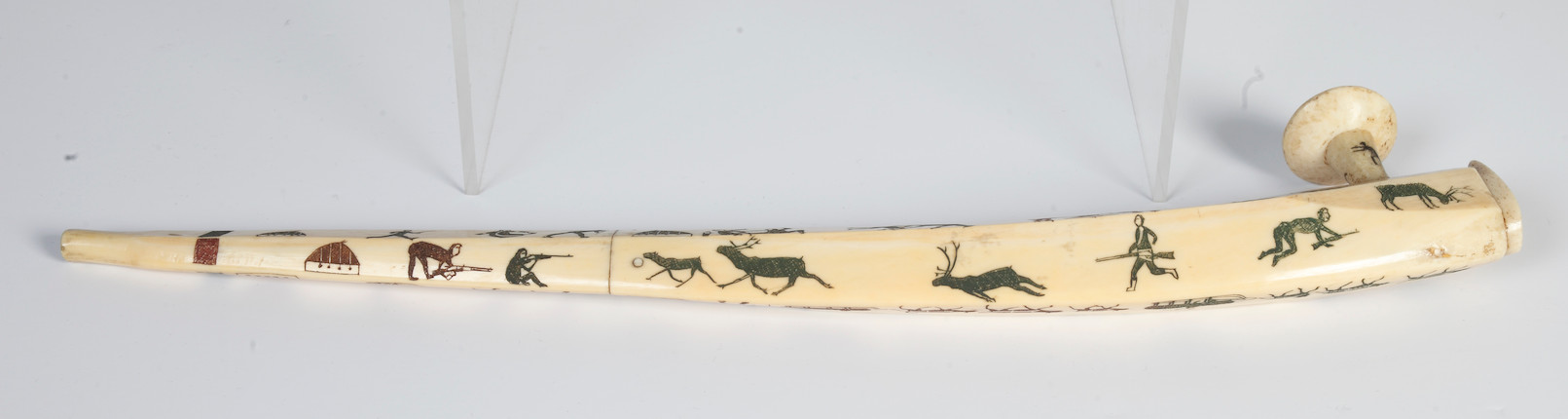 Bonhams : An Eskimo scrimshaw ivory pipe