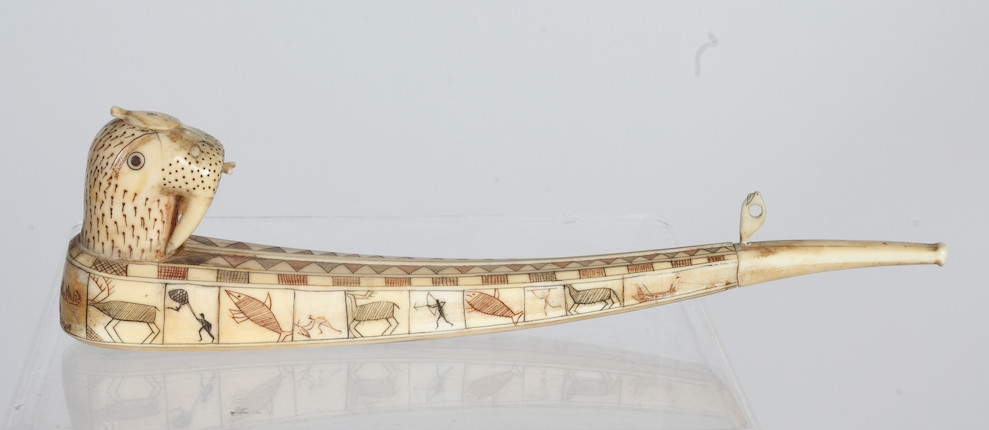 Bonhams : A fine Yup'ik stained walrus ivory pipe, c.1880-1900 Yup'ik ...