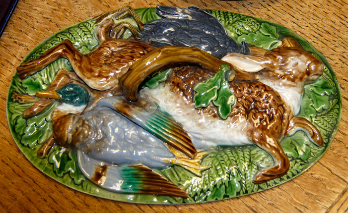 Bonhams : An English majolica cheese dome and stand, a teapot and cover ...