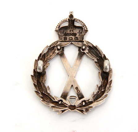 Bonhams : A silver Police Commissioner cap badge