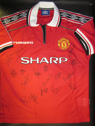 Bonhams : A Manchester United signed treble season replica shirt