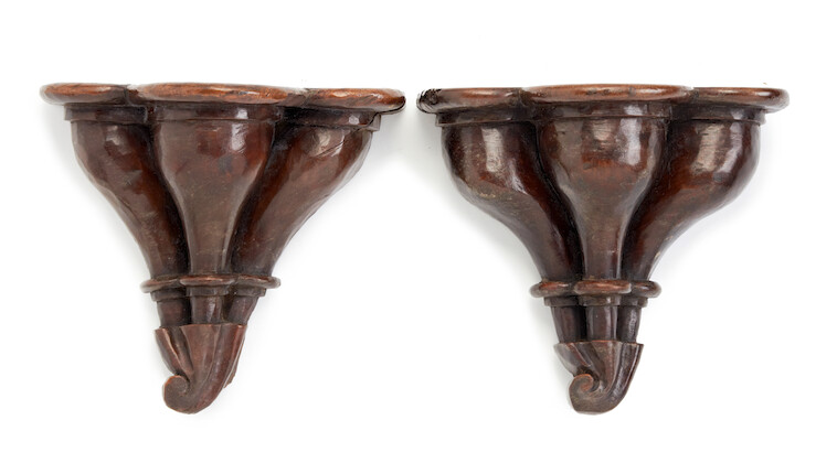 Bonhams : A pair of late 15th/early 16th century carved walnut misericord seat corbels, French