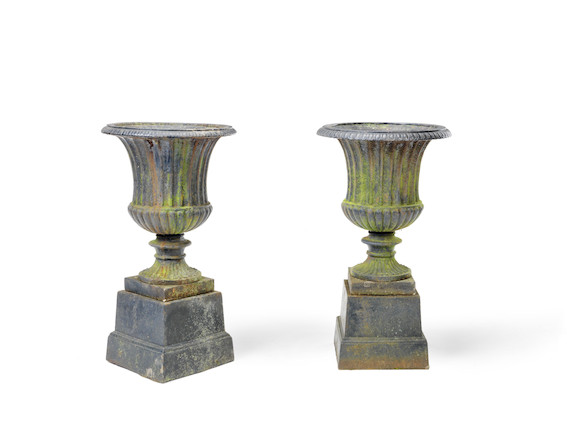 Bonhams : A pair of cast iron neo-classical style garden urns