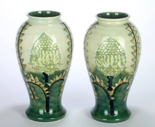 Bonhams : A pair of Moorcroft vases, another Moorcroft vase and a Sally ...