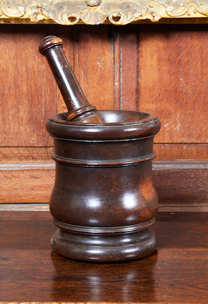 Bonhams : An early 18th century lignum vitae mortar, English, circa 1700
