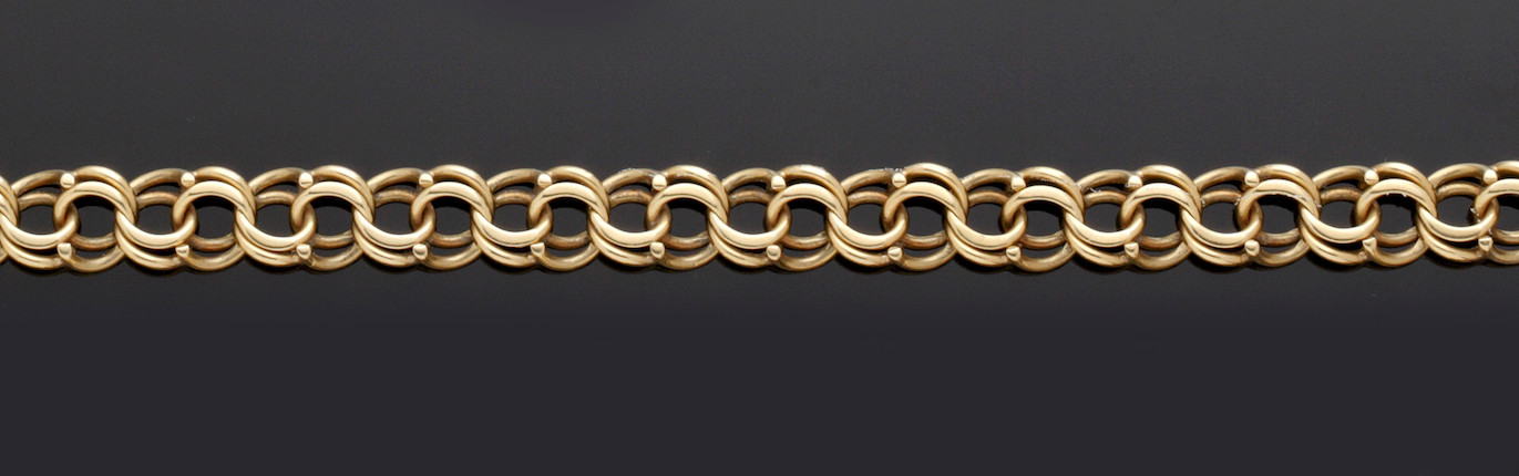 Bonhams : A double curb-link chain bracelet