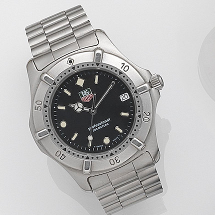 Bonhams : TAG Heuer. A stainless steel quartz calendar bracelet watch ...