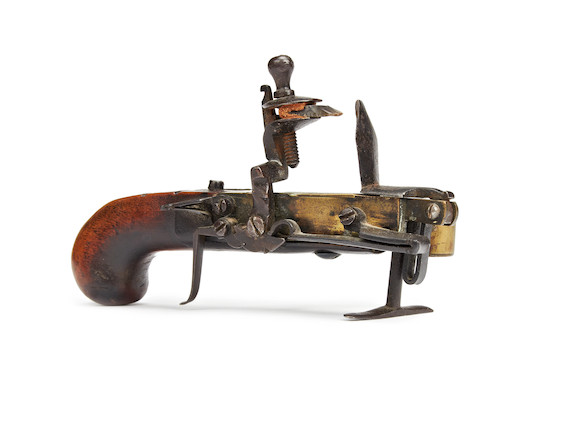 Bonhams : A mid-18th century engraved brass, iron and fruitwood ...