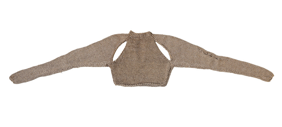Bonhams : Madonna A gold coloured knitted cropped jumper, made for ...