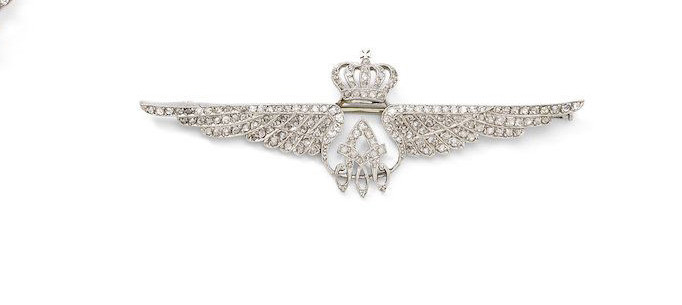 Bonhams : A diamond-set insignia brooch,
