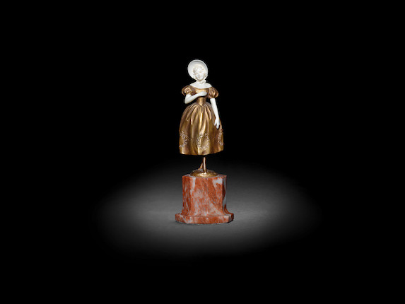 Bonhams : A bronze and carved ivory figure of a young woman by ...