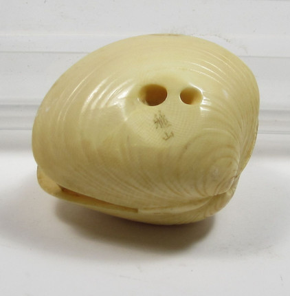Bonhams : An ivory 'clams dream' carving and a similar netsuke One by ...
