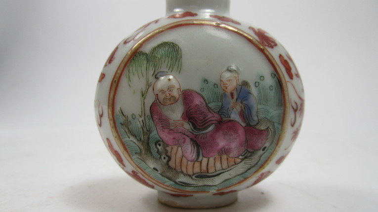 Bonhams Two Famille Rose Relief Moulded Snuff Bottles 19th Century