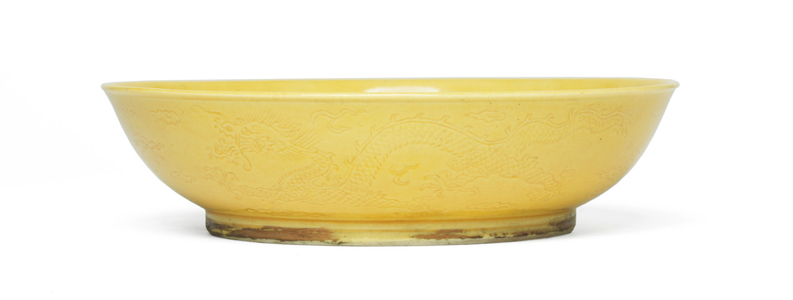Bonhams : A yellow-glazed incised 'dragon' dish Daoguang seal mark and ...