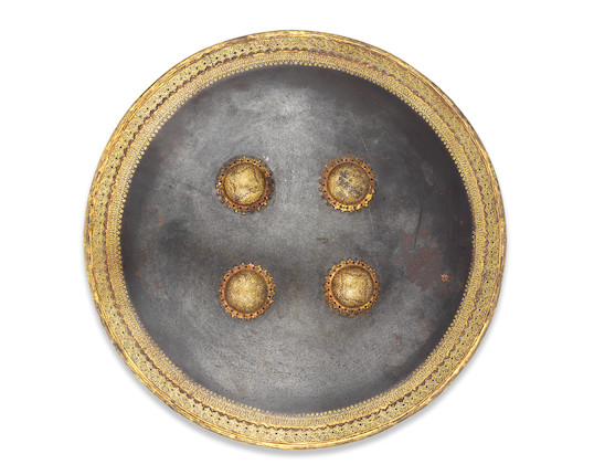 Bonhams : A gold koftgari steel shield (dhal) North India, 19th Century