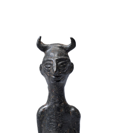 Bonhams : A Luristan bronze horned figure of a god