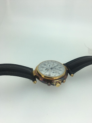 Bonhams : Alfred Dunhill. An 18K gold automatic triple calendar ...
