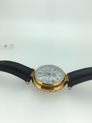 Bonhams : Alfred Dunhill. An 18K gold automatic triple calendar ...
