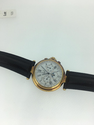 Bonhams : Alfred Dunhill. An 18K gold automatic triple calendar ...