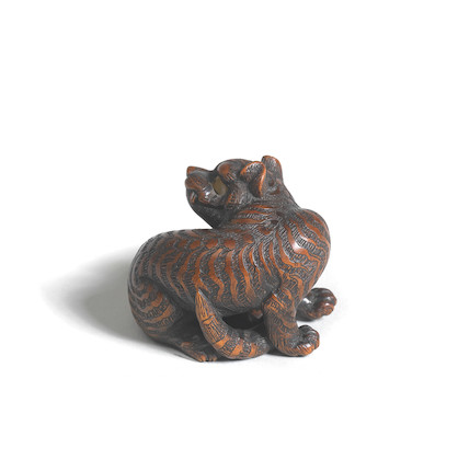 Bonhams : A WOOD NETSUKE OF A TIGER By Naito Toyomasa (1773-1856 ...