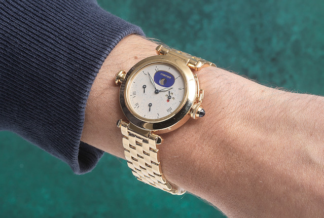 Bonhams : Cartier. A fine and rare 18K gold automatic minute repeating ...