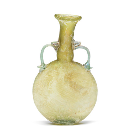 Bonhams : A Roman olive green glass ribbed lentoid flask with blue ...