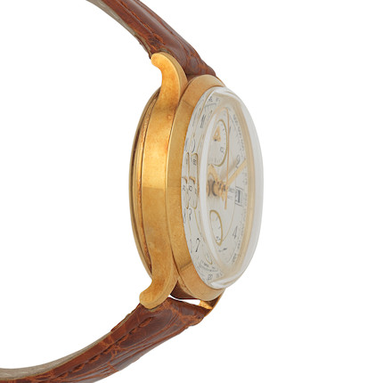 Bonhams : Philip Watch. An 18K gold automatic calendar chronograph ...