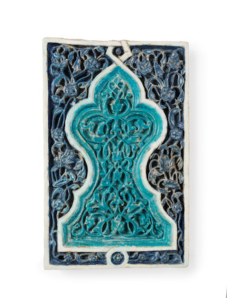 Bonhams : A Timurid moulded pottery tile Central Asia, late 14th Century