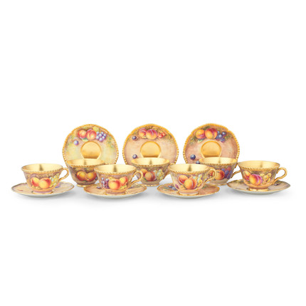 Bonhams : Seven Royal Worcester 'Painted Fruit' cups and saucers, late 20th century