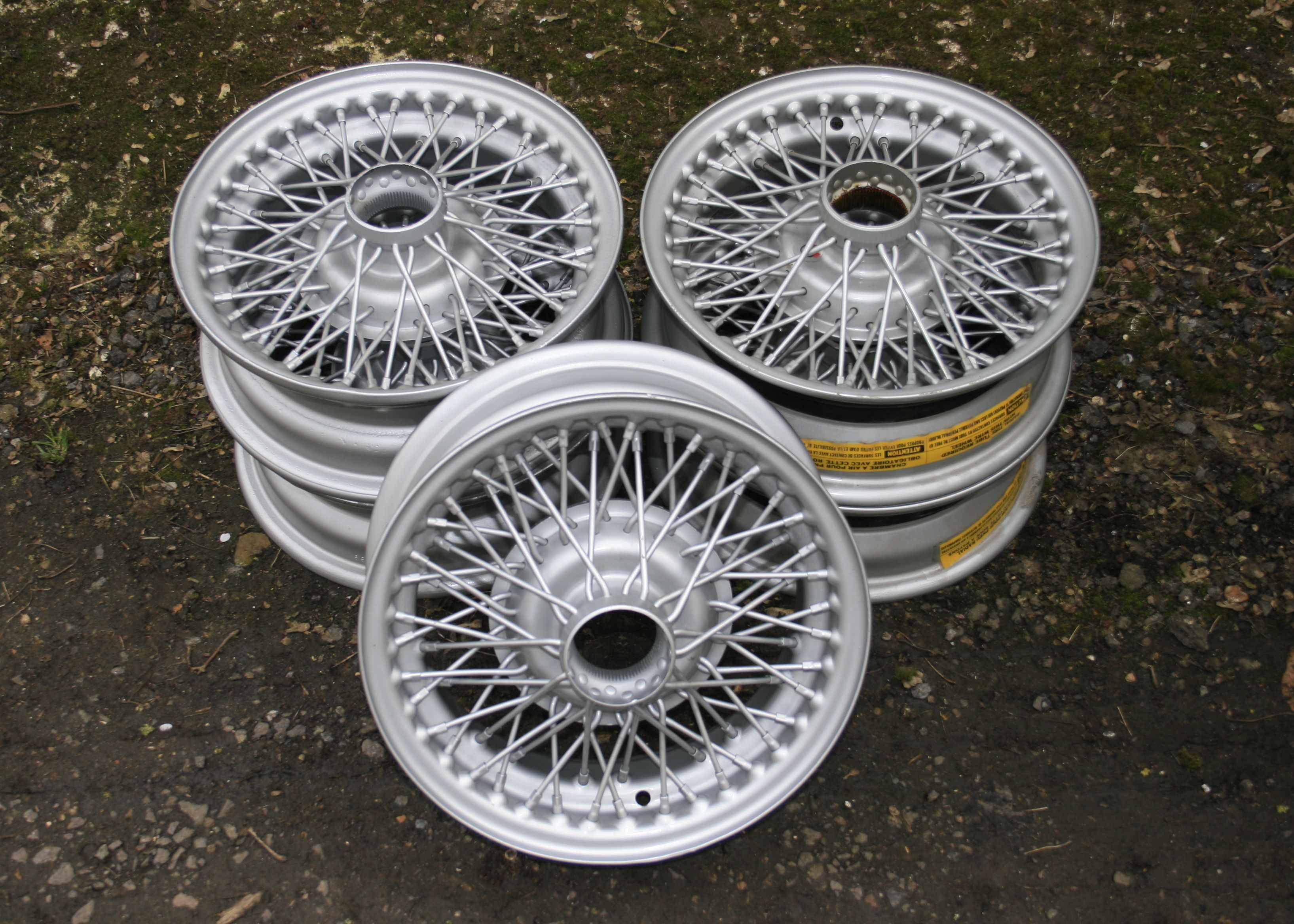 Bonhams Cars : A set of five Dunlop 14½ inch diameter wire spoked ...