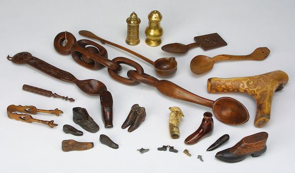 Bonhams : An antler powder flask, 7 1/4in. 18.5cm. long.